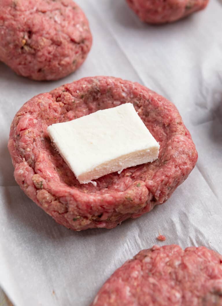 Mozzarella Stuffed Burgers with Pesto Mayo | Lemons + Zest