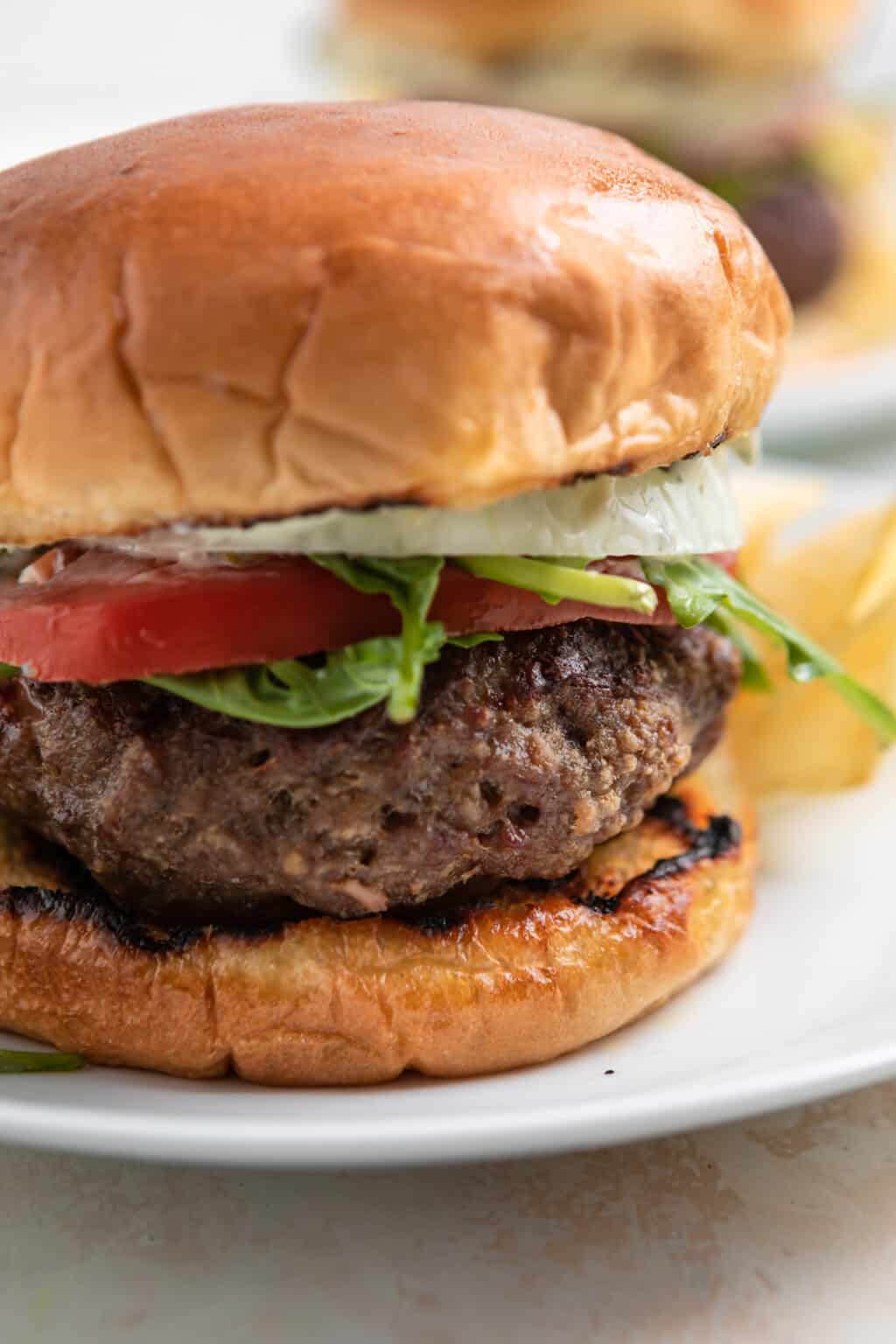 Mozzarella Stuffed Burgers with Pesto Mayo | Lemons + Zest